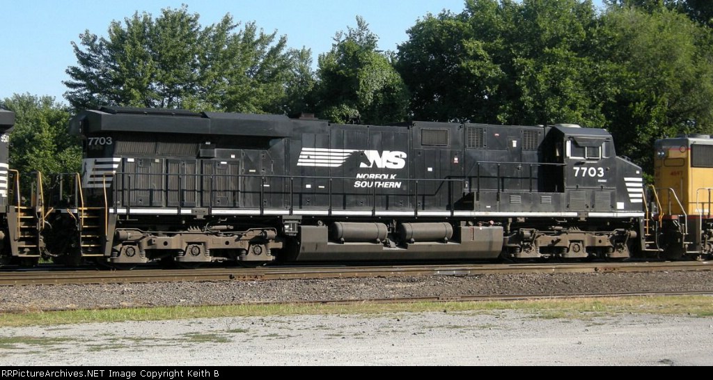 NS 7703
